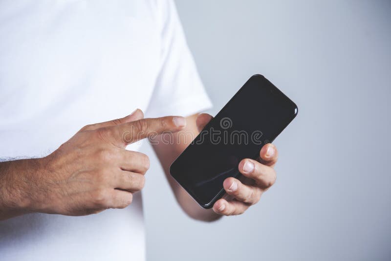Man hand smart phone stock image. Image of people, cellular - 157847091