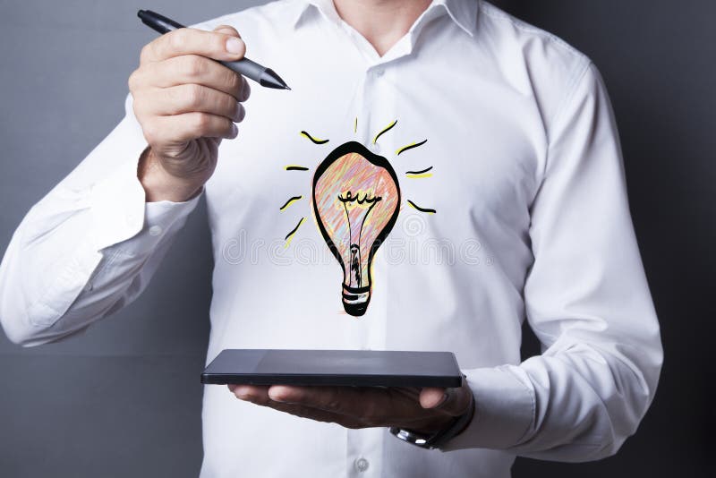 Man Hand Tablet with Light Bulb in Screen Stock Image - Image of device ...