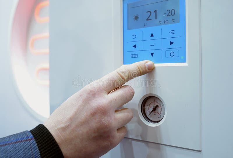 Man Hand Touching Control Panel Sensor of a Heat Pump Comfort System ...