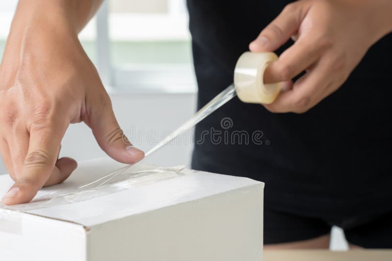 Man Hand Transparent Man Packing Box Adhesive Tape. Stock Photo - Image ...