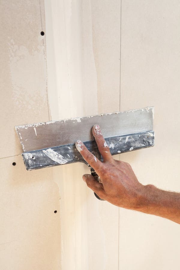 Man Hand with Trowel Plastering a Wall. Stock Image - Image of cracks ...