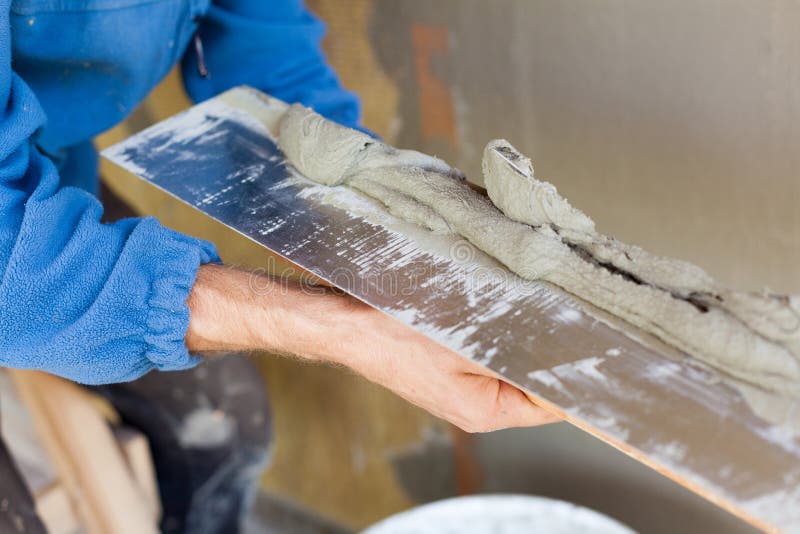 Man Hand with Trowel Plastering a Wall. Stock Photo - Image of cement ...