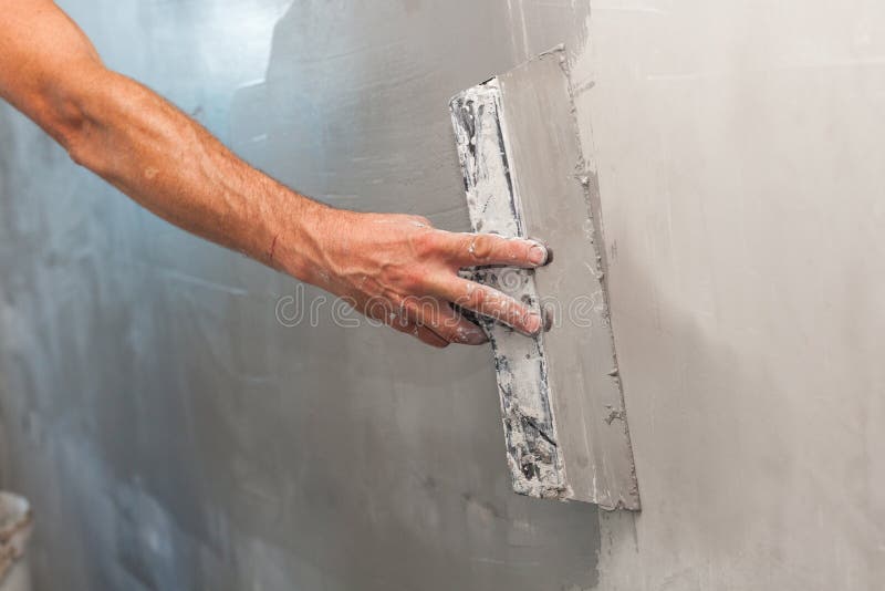Man Hand with Trowel Plastering a Wall. Stock Photo - Image of builder ...