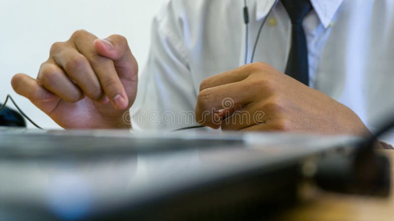 Man Hand Typing on a Laptop Keyboard. Businessman Hands Busy Working on ...