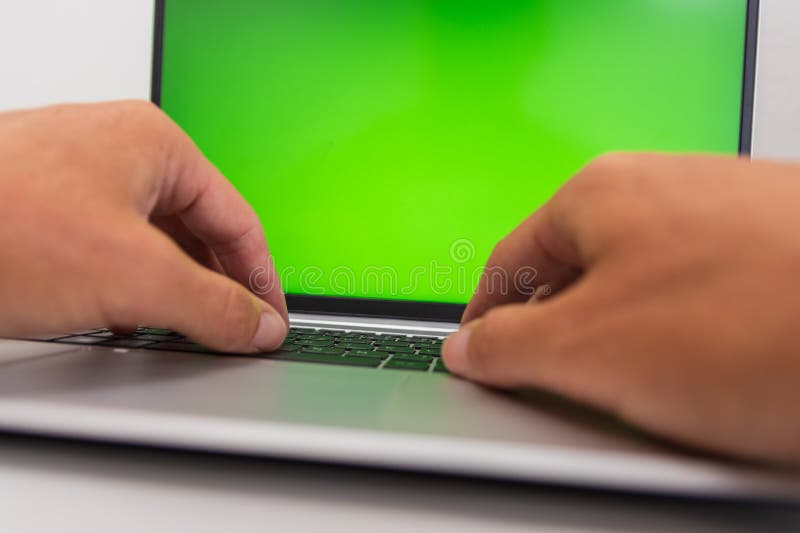 Man Hand Typing on Metal Notebook Keyboard with Green Screen Stock ...