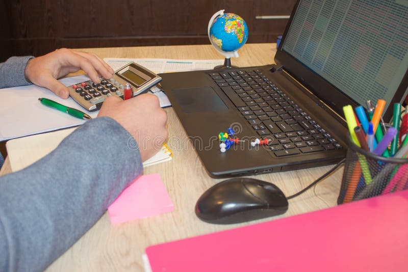 Man Hand Using Calculator and Writing Make Note with Calculate about ...
