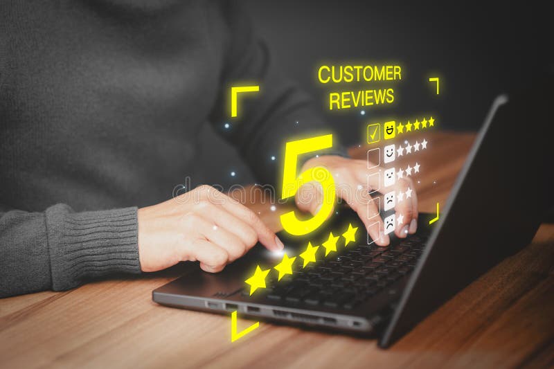 Man Hand Using a Computer Laptop with Pop Up Smiley Face and Five Star ...