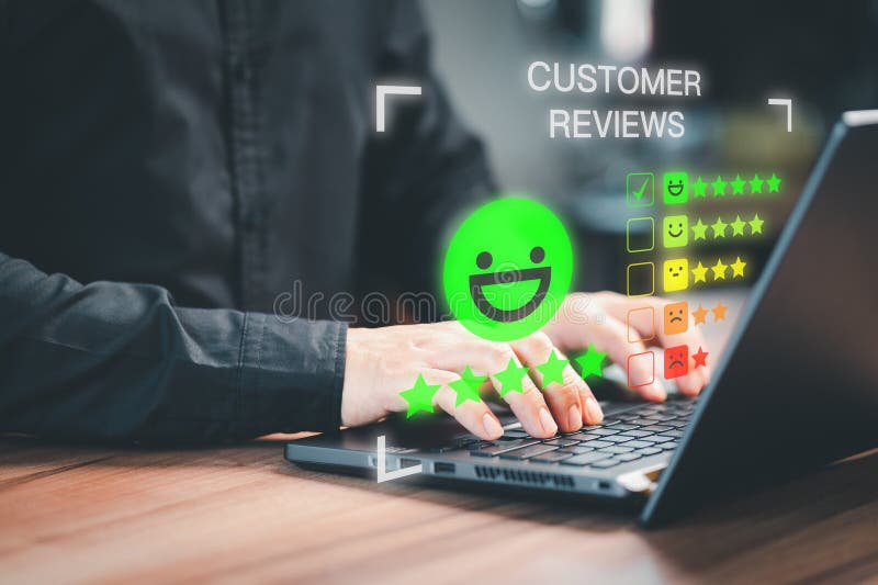 Man Hand Using a Computer Laptop with Pop Up Smiley Face and Five Star ...