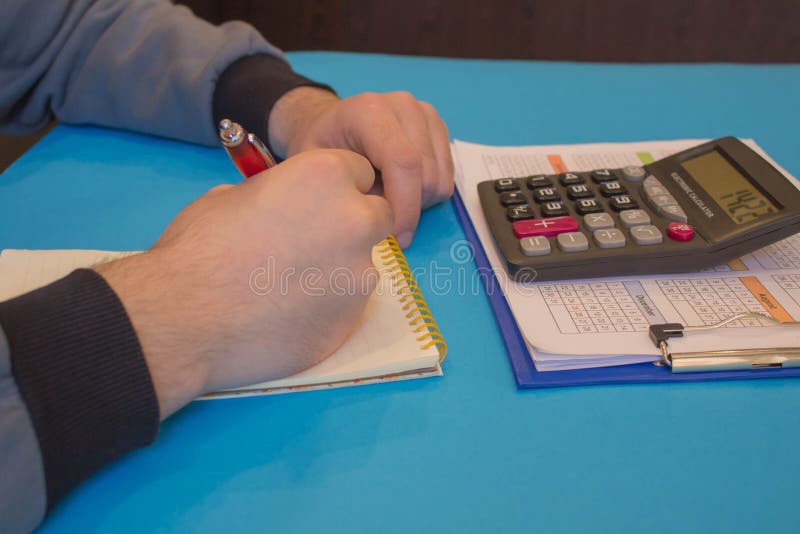 Man Hand Using Pen for Writing Data Information. a Businessman Doing ...