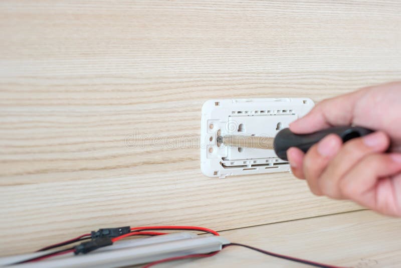 Man Hand Using Screwdriver Installing Wire Cables for Socket Plug ...