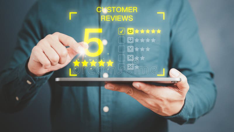 Man Hand Using a Tablet with Pop Up Smiley Face and Five Star Icon for ...