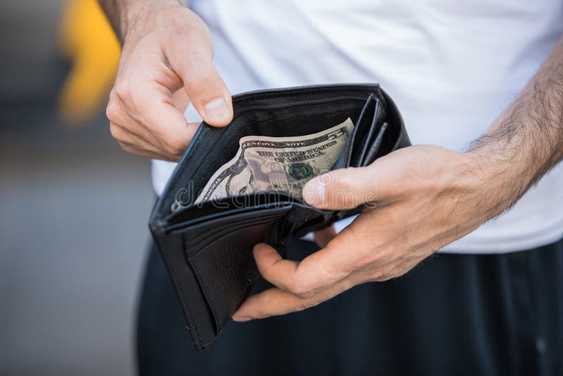 Man hand wallet in street stock image. Image of purse - 211582841