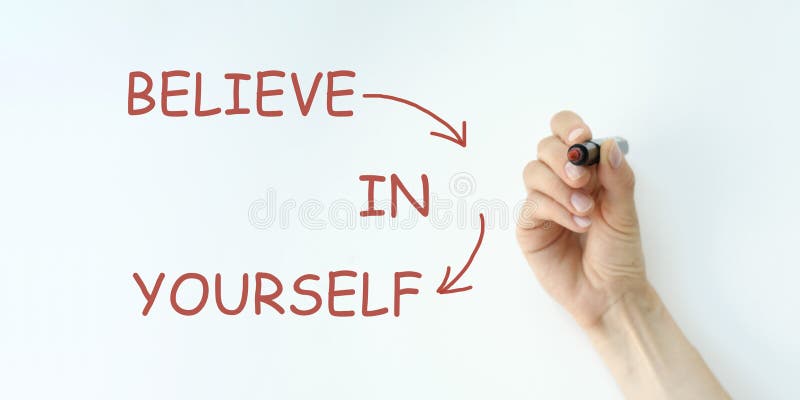 Man Hand Writing Believe in Yourself with Red Marker on Visual Scr ...