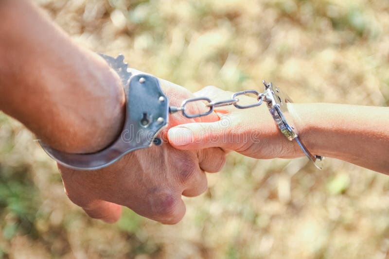 Man Handcuffed Outdoors in the Park Stock Photo - Image of bracelet ...