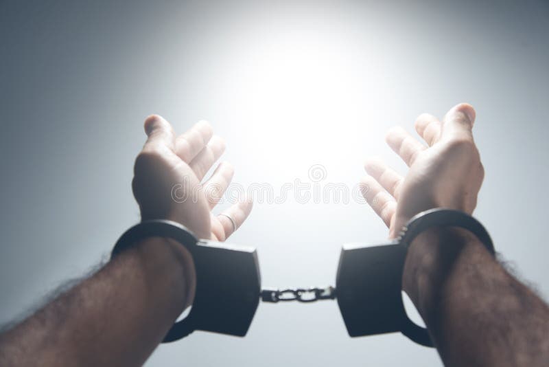 Man Handcuffs with Light and Palm Stock Photo - Image of church, light ...