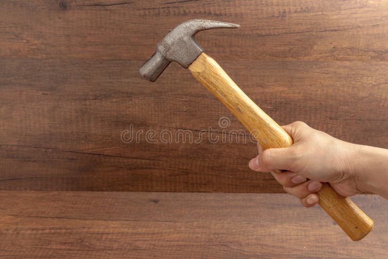 Man Handle a Hammer on Wooden Background Stock Image - Image of closeup ...