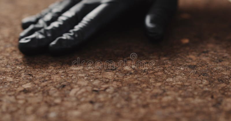 Man Hands in Black Gloves Touch Dark Cork Surface Stock Image - Image of grunge, check: 380256545