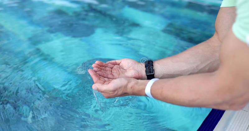 Man Hands Clasped Together Partially Immersed in Clear Blue Water Stock ...