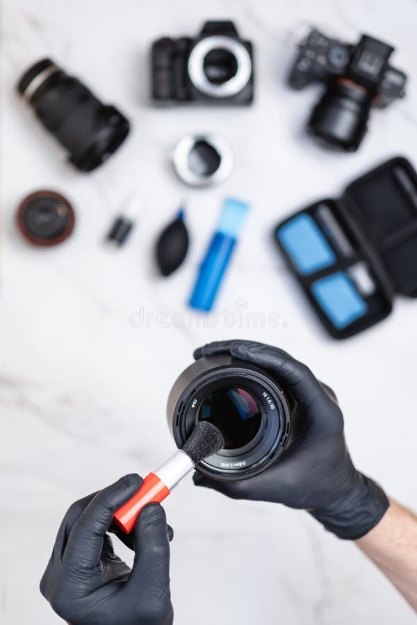 Man Hands Cleaning Camera Lens with Small Brush on Cleaning Workstation ...