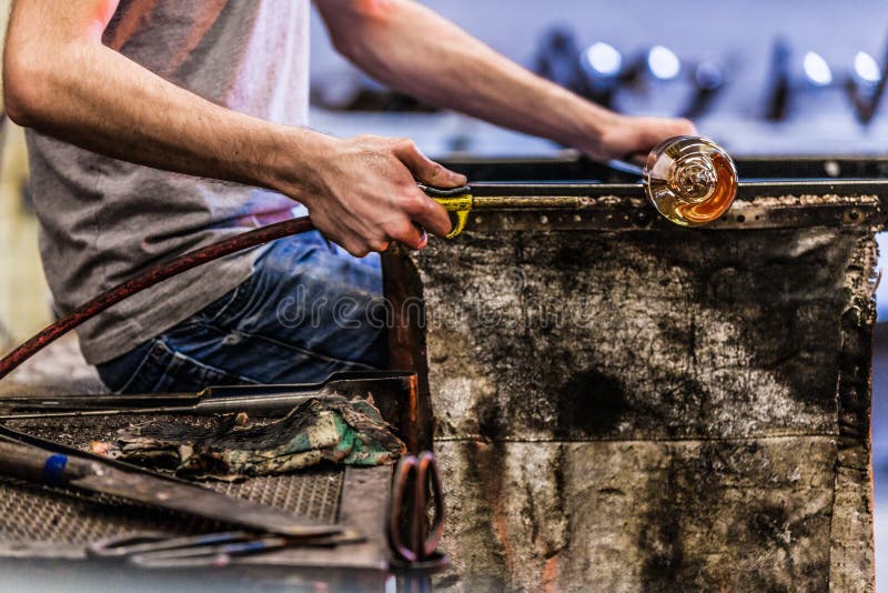 Man Hands Closeup Working on a Blown Glass Piece Stock Image - Image of ...