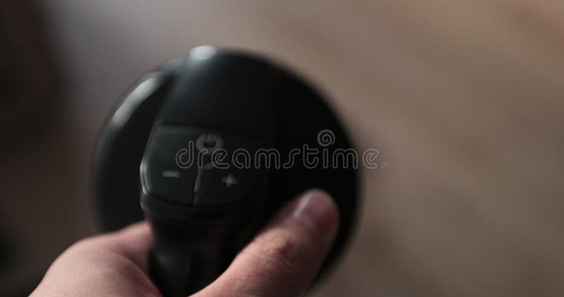 Man Hands and Control Wireless Portable Vacuum Cleaner. Technology ...