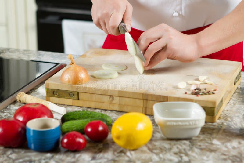 Chief Cook Cut the Cucumber with the Big Knife in the Kitchen Stock ...