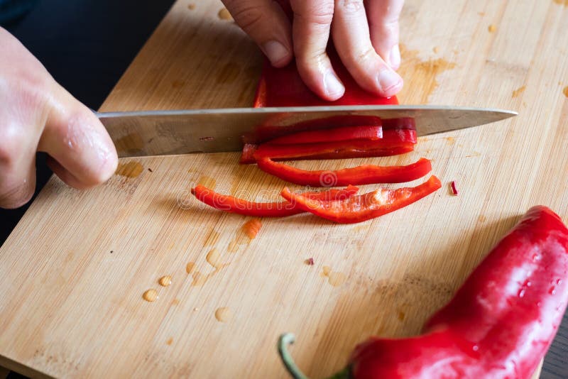 Man Hands Cutting Red Pepper on Wooden Board Stock Photo - Image of ...