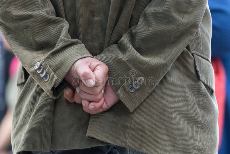 Man with folded hands stock image. Image of watching - 102975069
