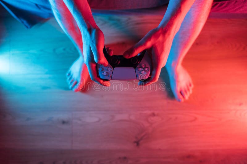 Man Hands with Game Controller in Neon Light, Top View Stock Image ...