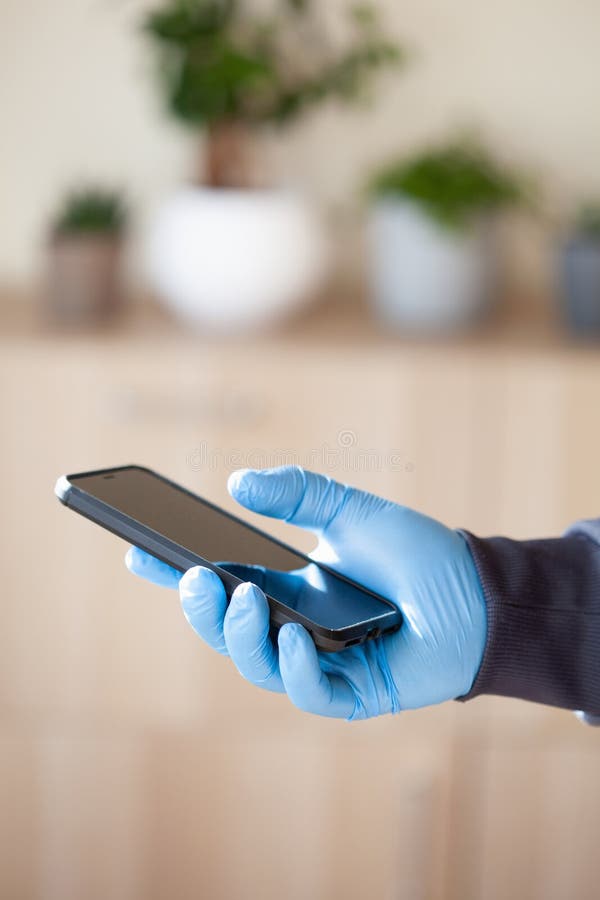 Man Hands in Gloves Using Smartphone, Preventing Germs Coronavirus ...