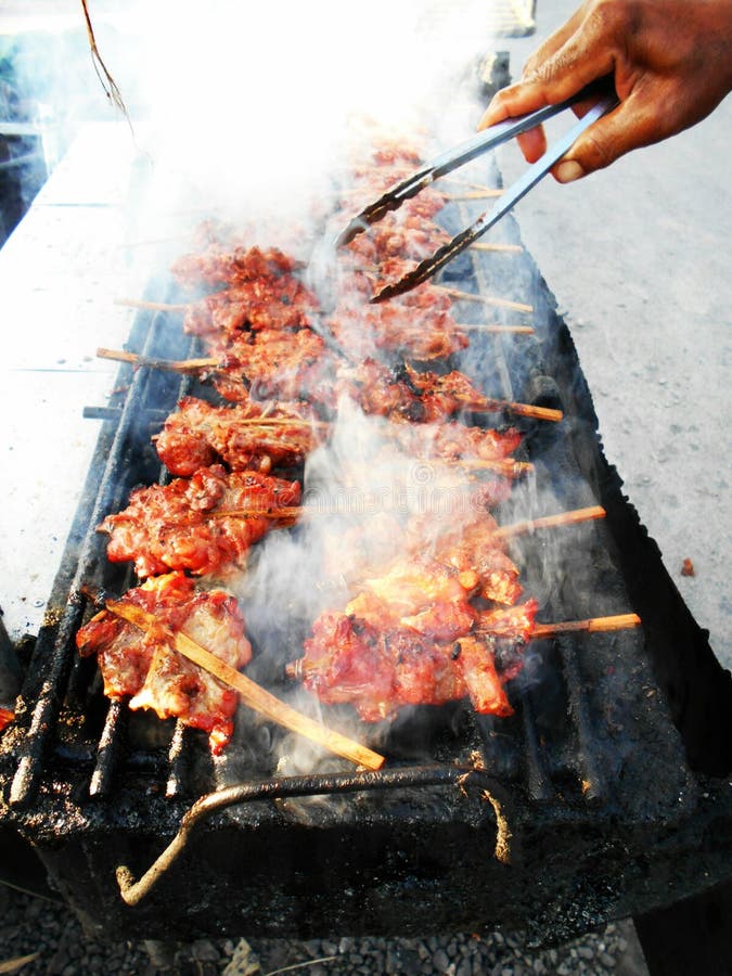 Grilling chicken stock image. Image of smoke, chicken - 107154137