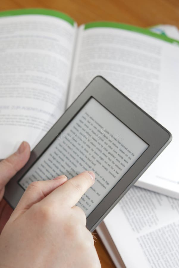 Reading with a Kindle E-reader Editorial Stock Photo - Image of device ...