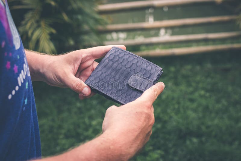 Man Hands Holding Luxury Snakeskin Python Wallet. Stock Photo - Image ...