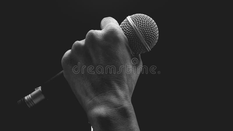 Hand Holding a Microphone on a Stand Stock Photo - Image of microphone ...