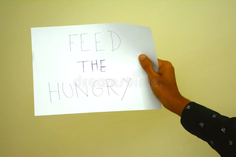 Man Hands Holding A Paper, Feed The Hungry Concept Stock Photo - Image ...