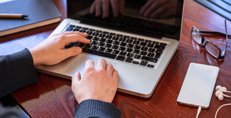 Man Hands on a Laptop Keyboard, Wood Office Desk, Closeup View Stock ...
