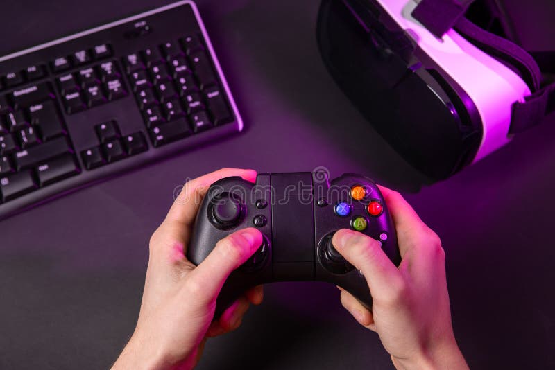 Man Hands Playing a Computer Game with a Game Joystick. Stock Photo ...
