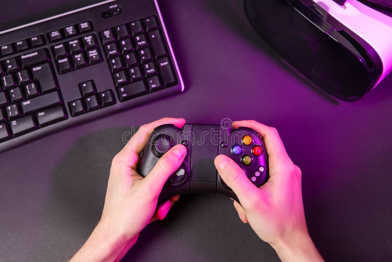 Man Hands Playing a Computer Game with a Game Joystick. Stock Image ...