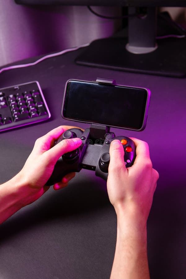 Man Hands Playing a Computer Game with a Game Joystick. Stock Photo ...