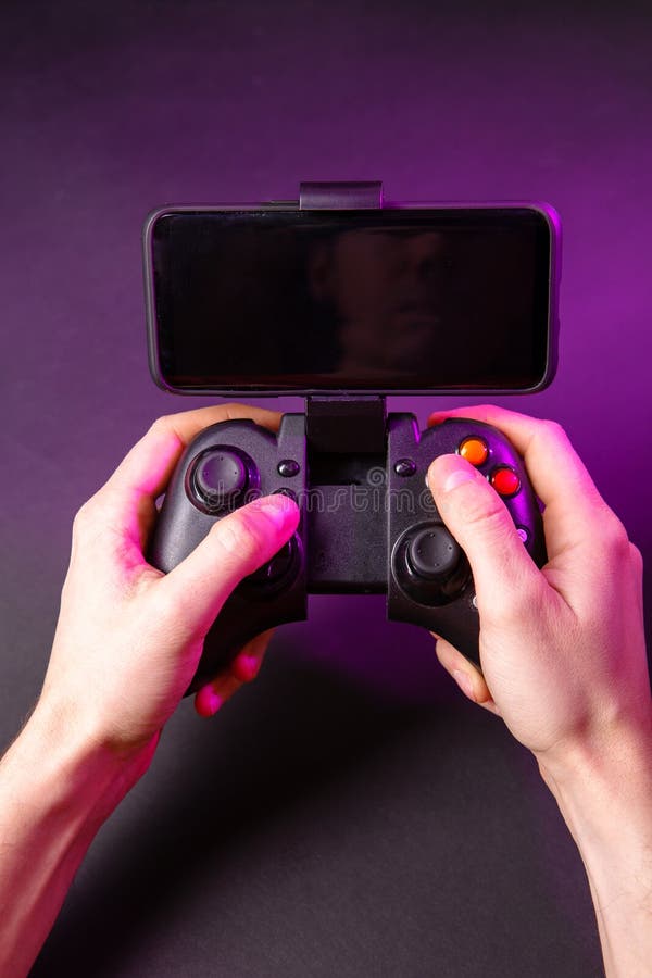 Man Hands Playing a Computer Game with a Game Joystick. Stock Photo ...