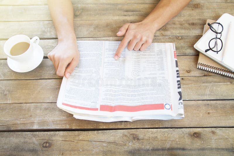 Man Hands Reading Newspaper Stock Image - Image of working, desk: 102103401