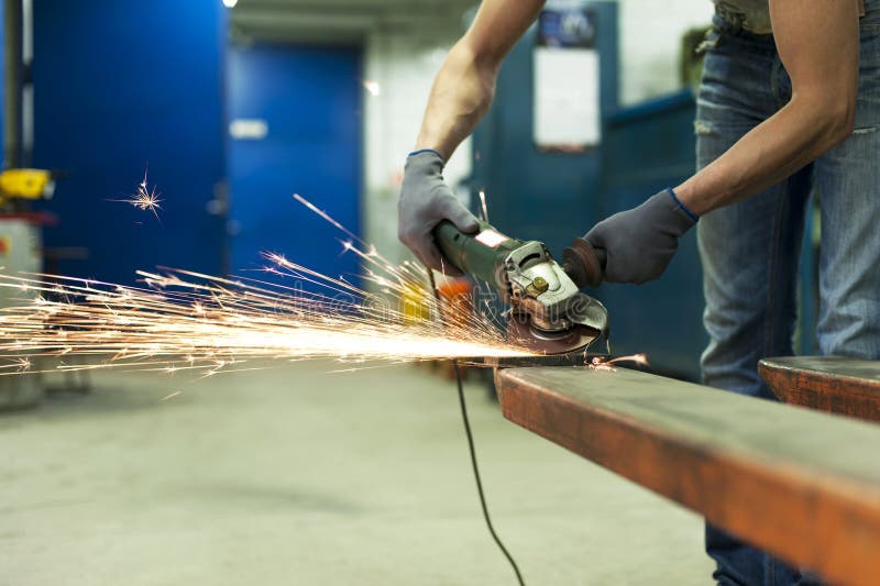 Man Hands Sawing Metal with Sparks in Workshop Stock Image - Image of ...