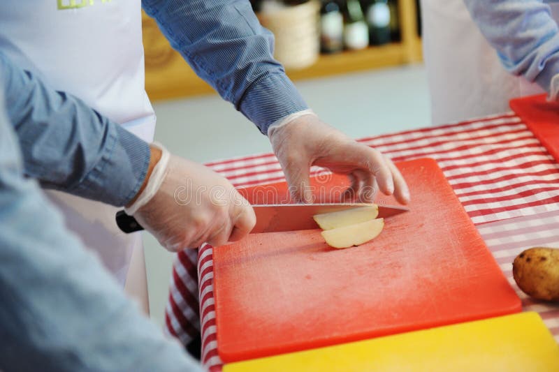 Man Hands Slicing Fresh Potato on Chopping Board Stock Image - Image of ...