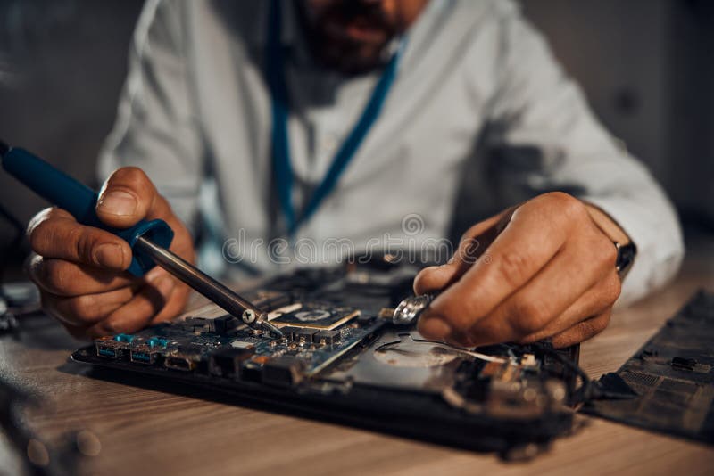 Man Hands, it or Soldering Motherboard in Engineering Workshop for ...