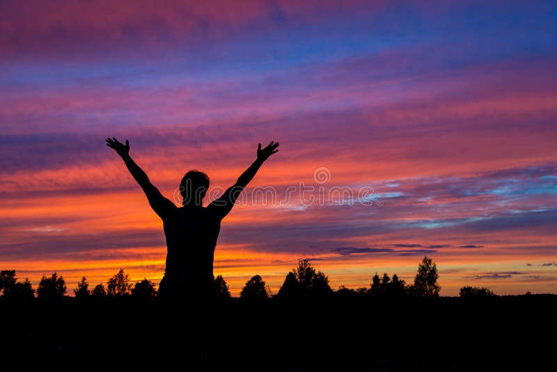 Man with Hands Up Silhouette with Colorful Sunset Stock Photo - Image ...