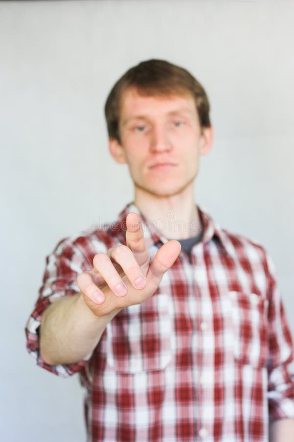 Man handsome. Pointing stock photo. Image of female - 110318688