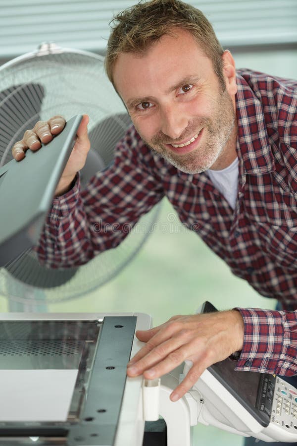 Man Happy after Fixing Printing Machine Stock Photo - Image of ...