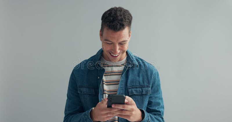 Man, Happy or Message on Cellphone in Studio, or Notification on Mobile ...