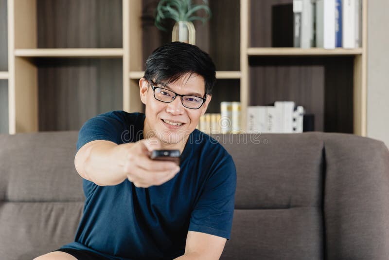 Man Happy Smile Pointing Tv Remote Control for Watching Home ...