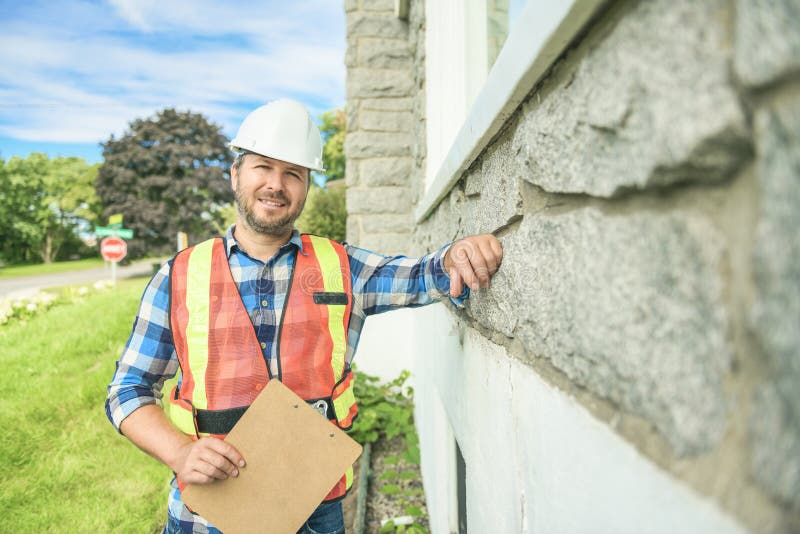 Man with Hard Hat Inspecting House Concreate Stock Image - Image of ...